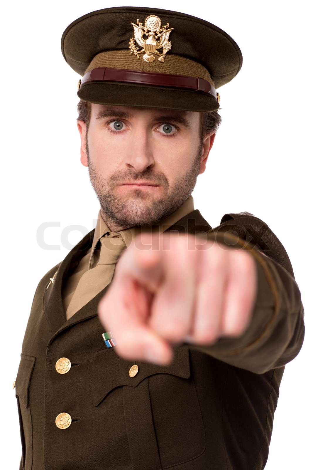 Young soldier pointing towards camera | Stock image | Colourbox