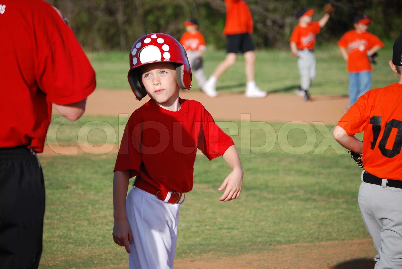 Cute little baseball boy | Stock image | Colourbox