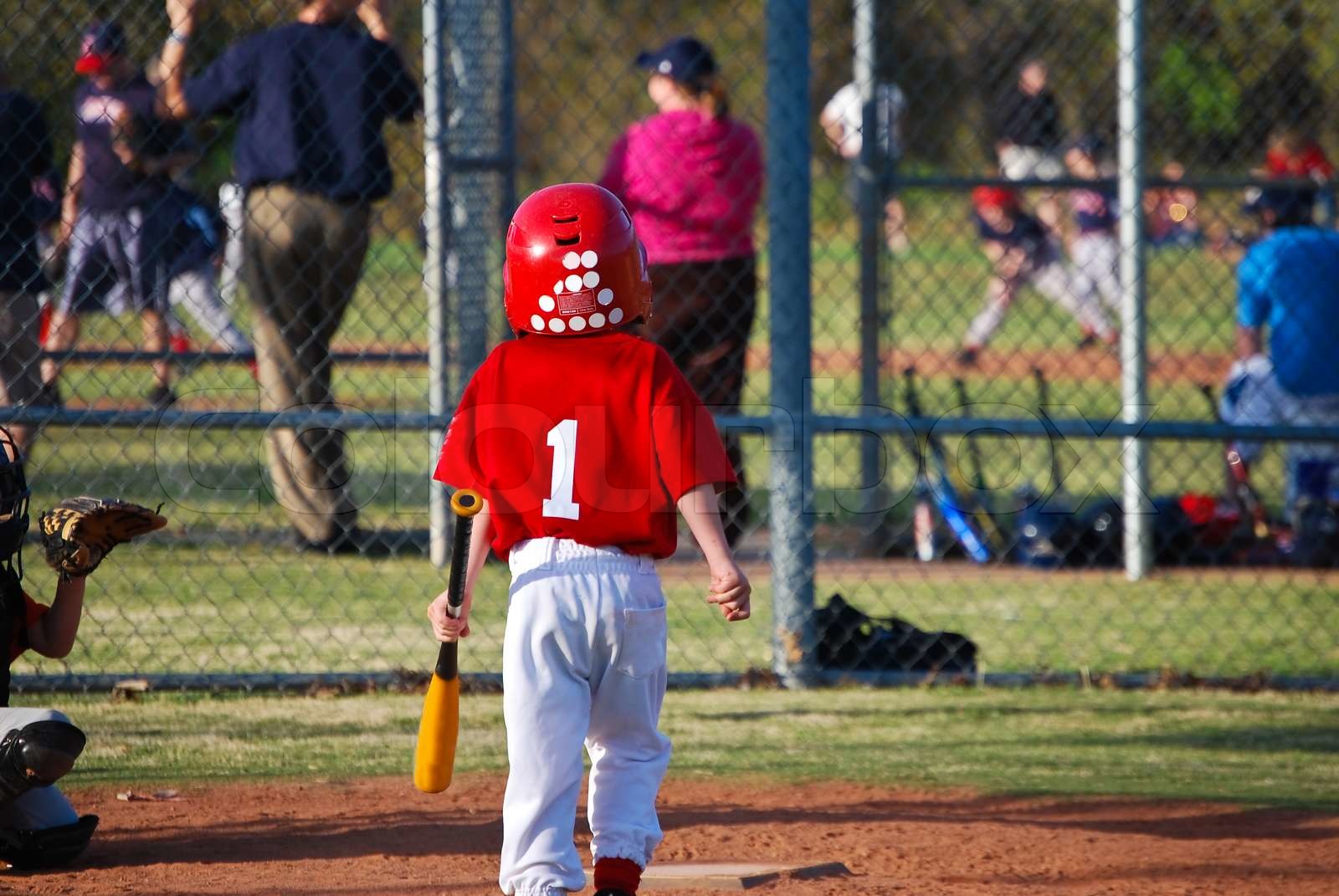 Little league batter from behind | Stock image | Colourbox