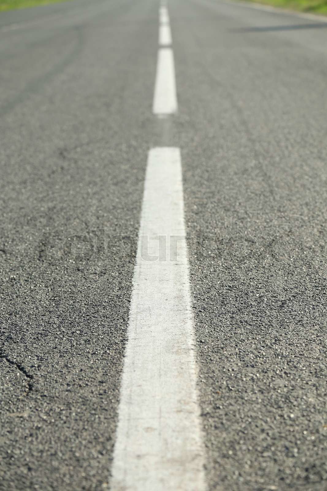 Arrow signs as road markings on suburban driveway | Stock image | Colourbox