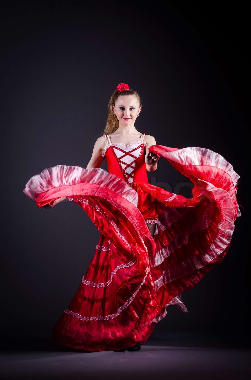 Girl in red dress dancing dance | Stock image | Colourbox