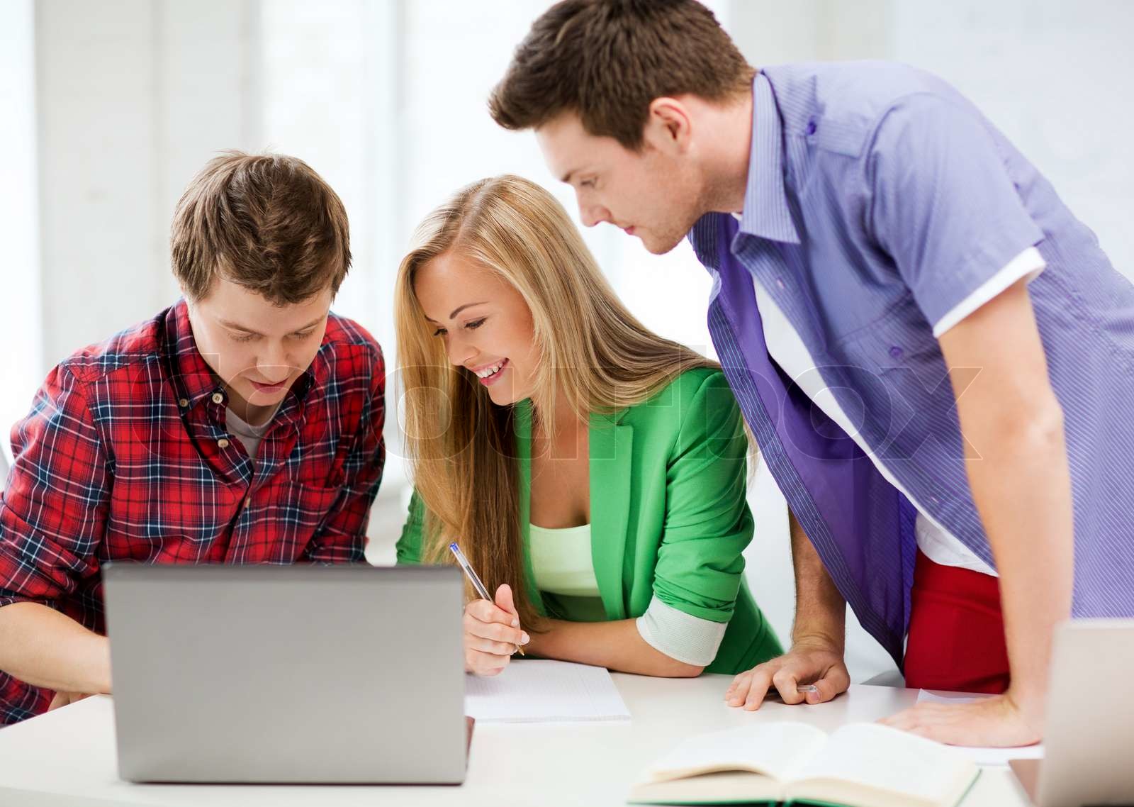 students writing test or exam in lecture at school | Stock image ...