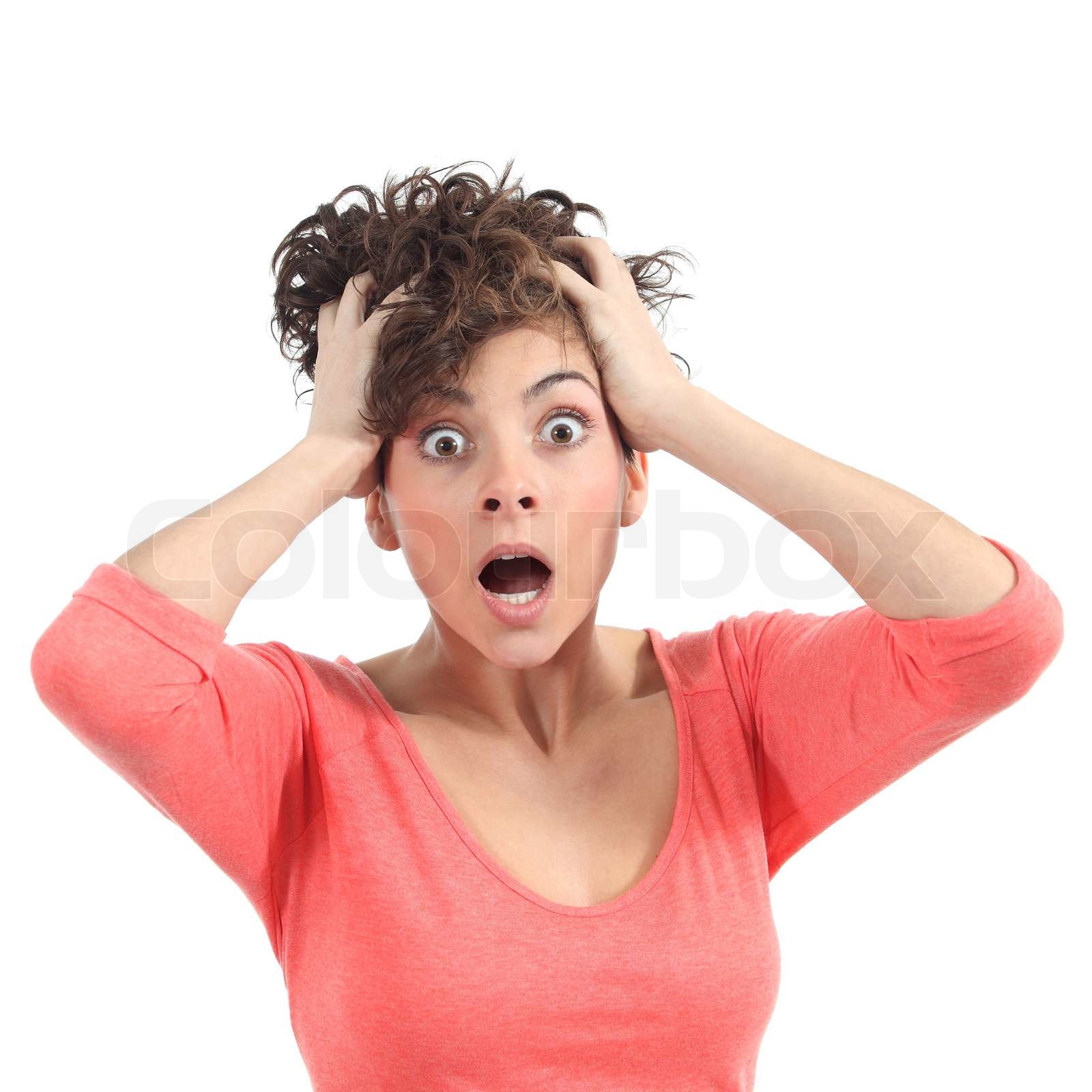 Scared woman with her hands on the head and opened mouth | Stock image ...