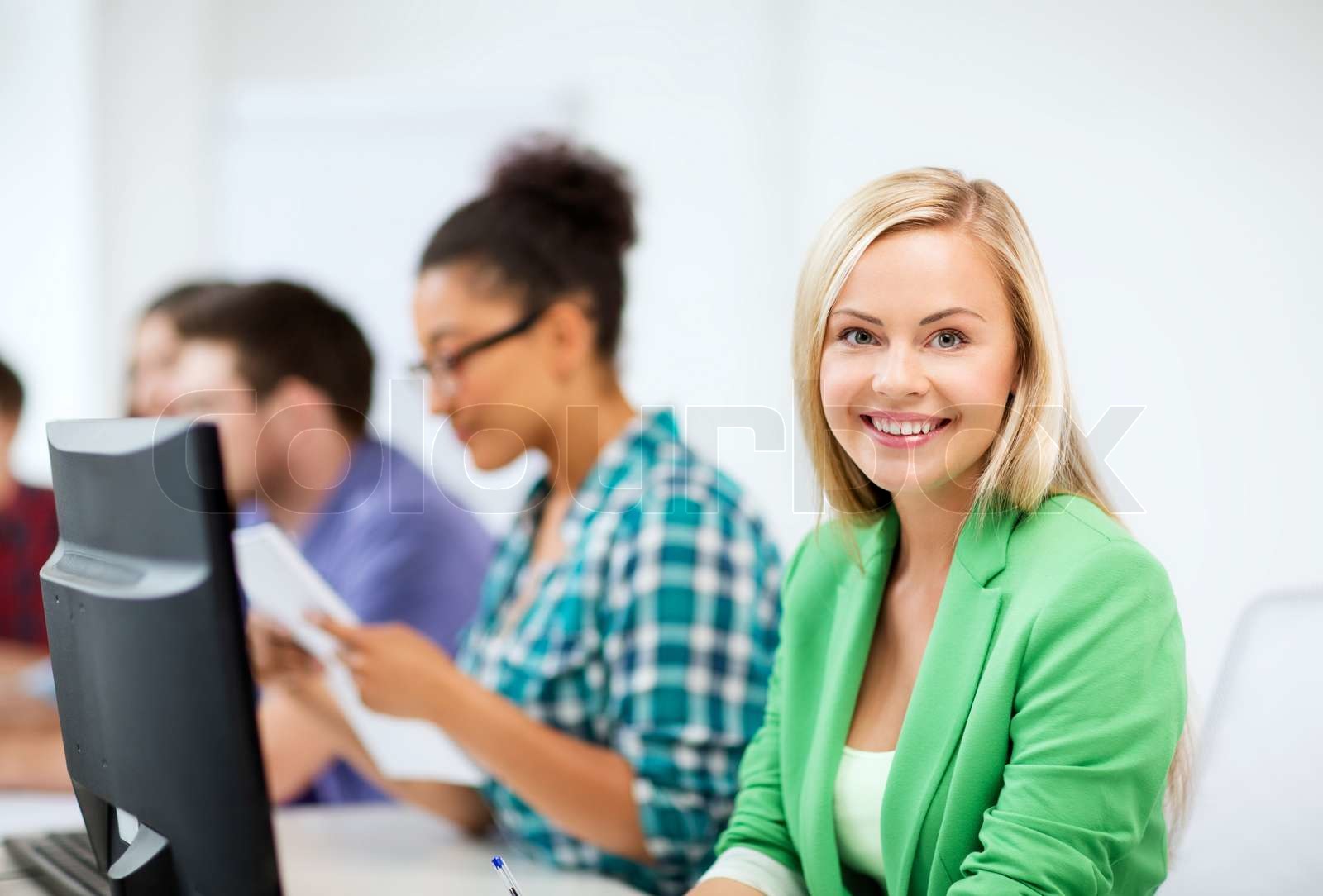 student with computer studying at school | Stock image | Colourbox
