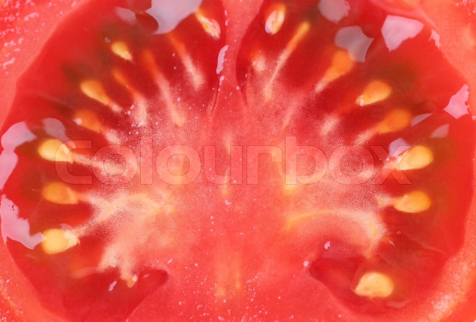 Scheibe Tomate auf einem weißen Hintergrund | Stock Bild | Colourbox