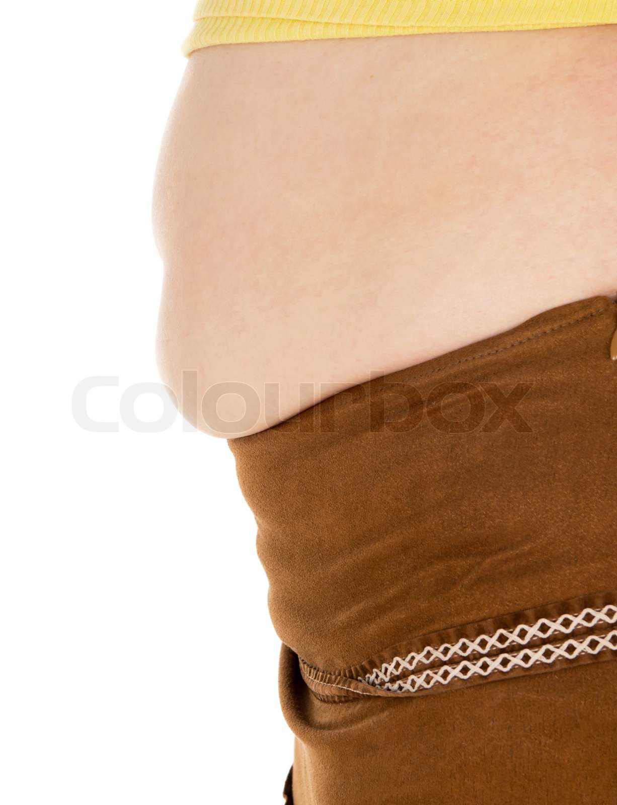 Mädchen zeigt seinen fetten Bauch | Stock Bild | Colourbox