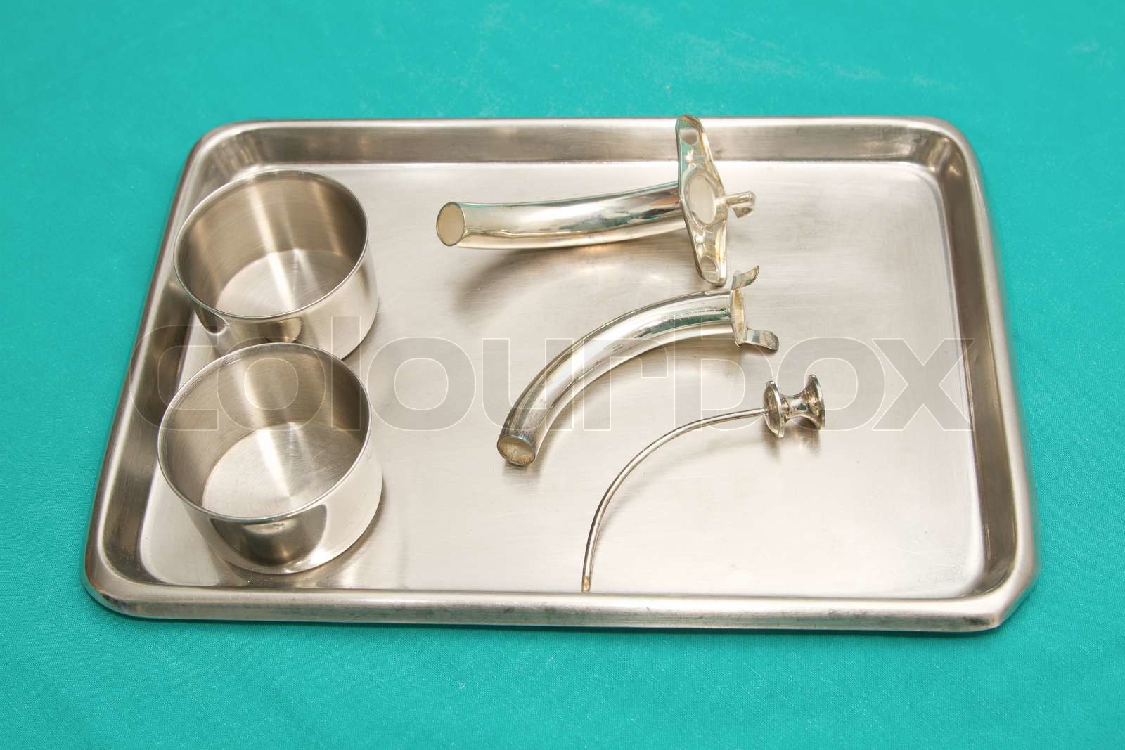 silver tracheostomy tube set ,surgical instrument on sterile tray ...