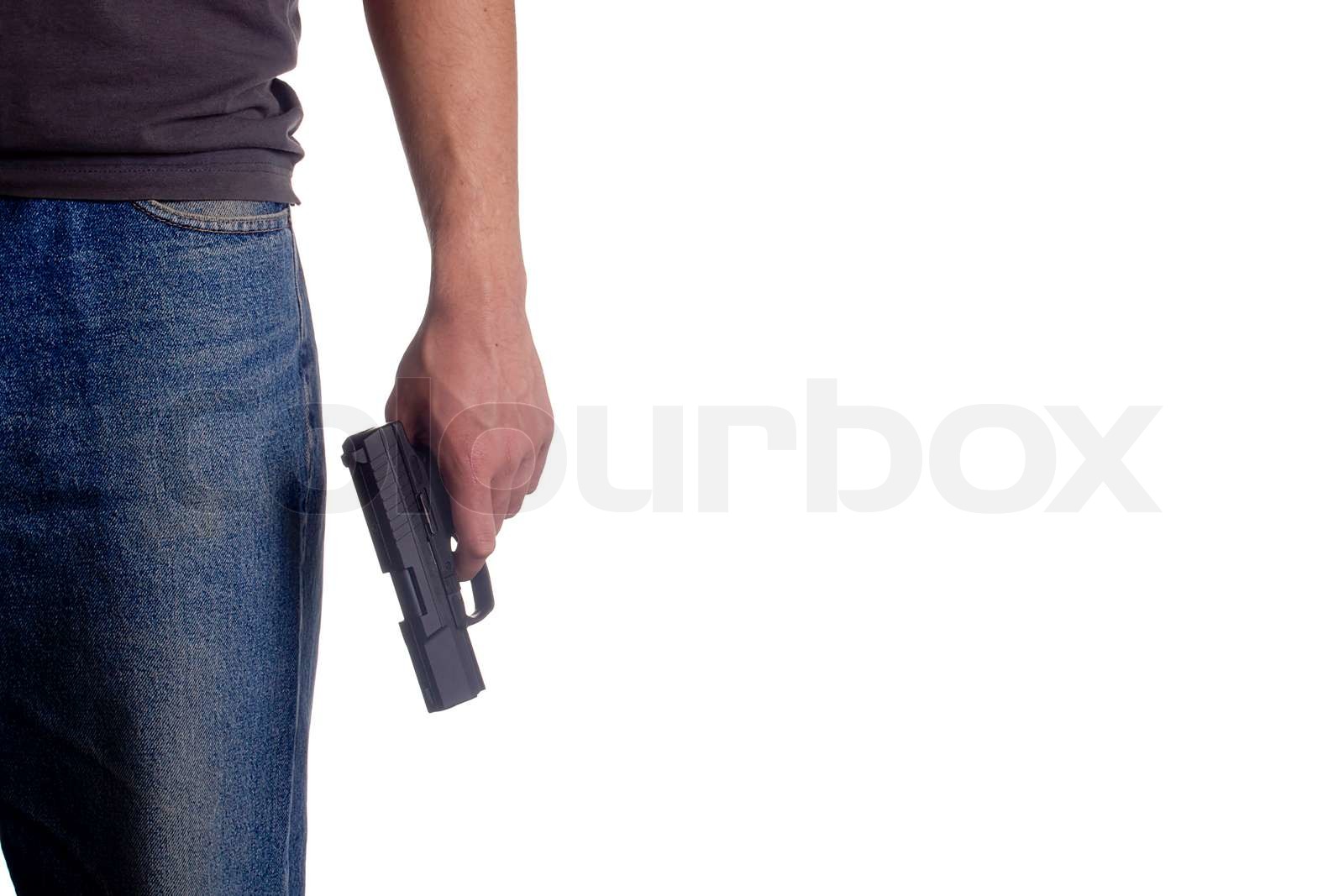 Man holding a pistol | Stock image | Colourbox