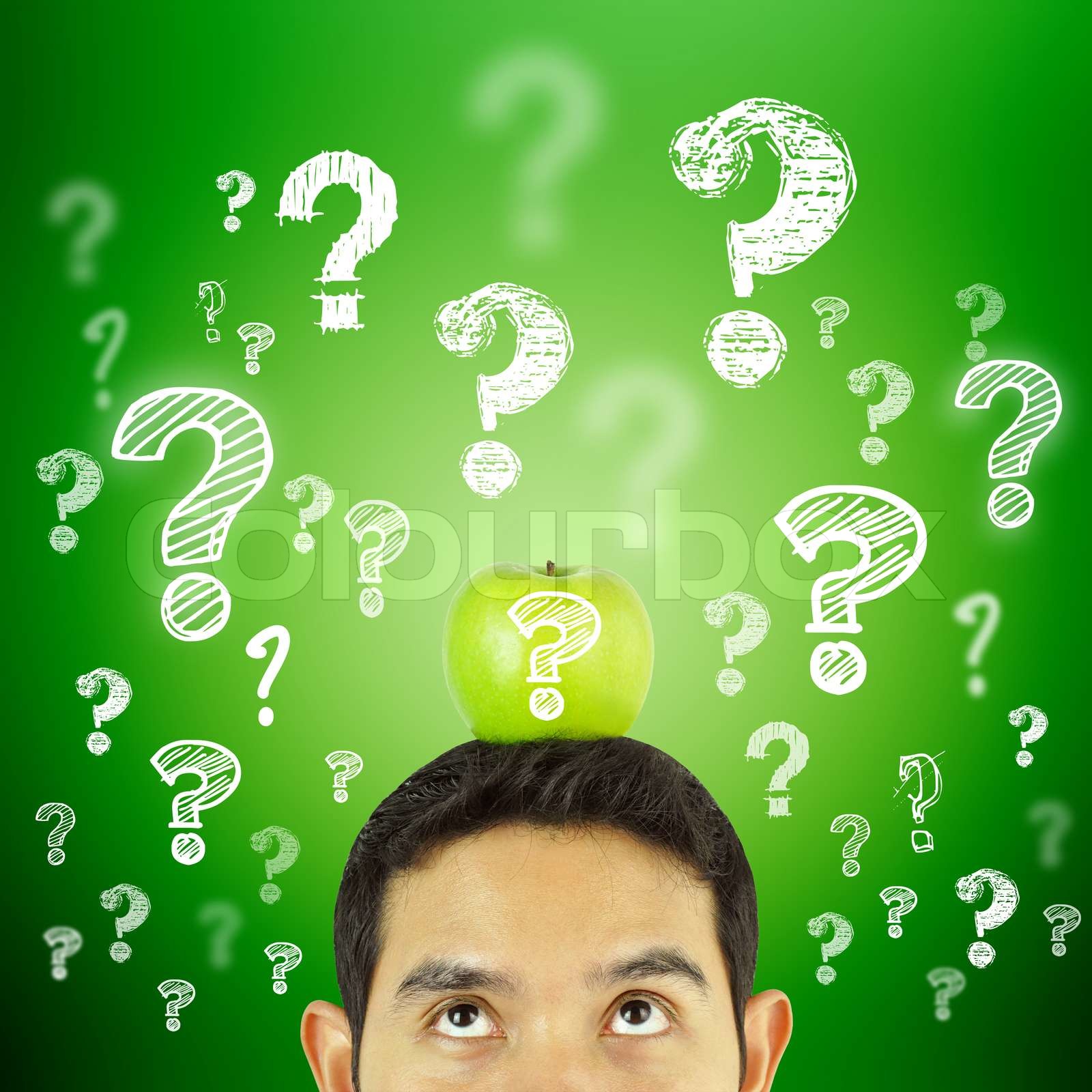 A man thinking with question marks | Stock image | Colourbox