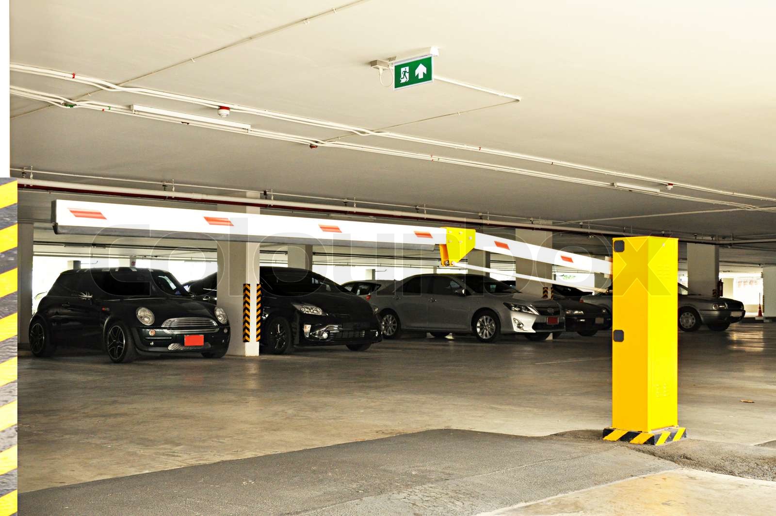 Car park entrance with the barrier | Stock image | Colourbox