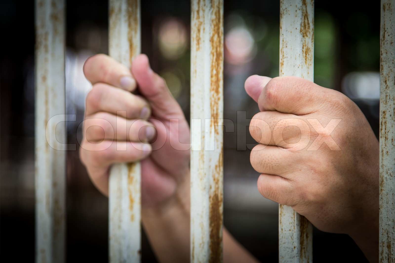 hand in jail | Stock image | Colourbox
