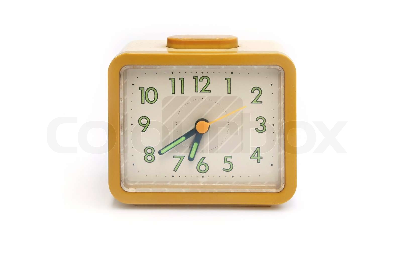 yellow clock isolated | Stock image | Colourbox