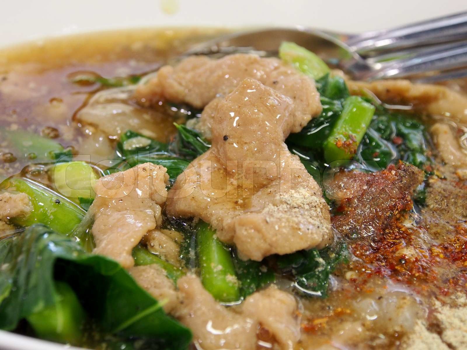 Fried noodle with pork. Lad Nah Thai food. | Stock image | Colourbox