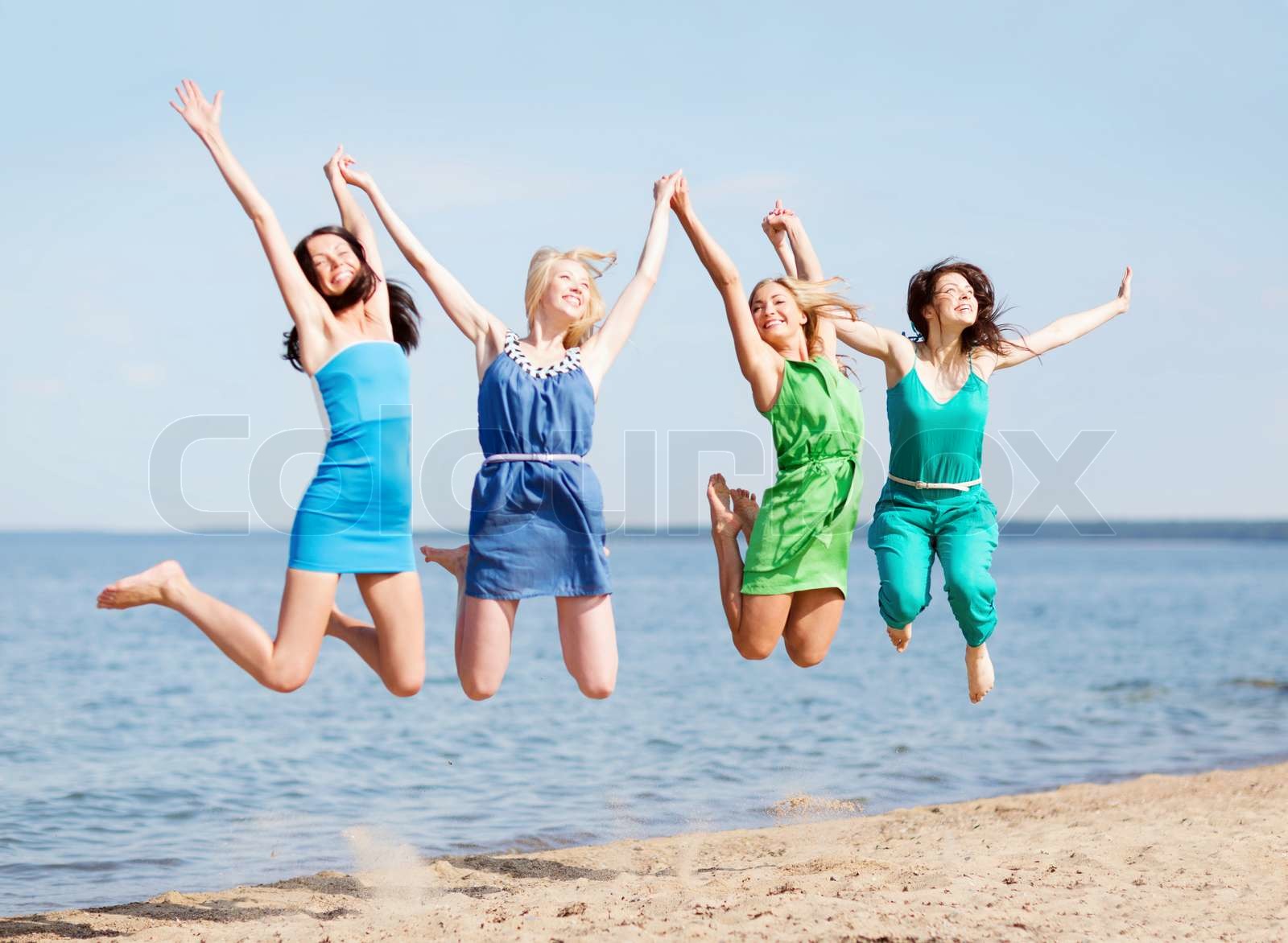 Three Girls Jumping