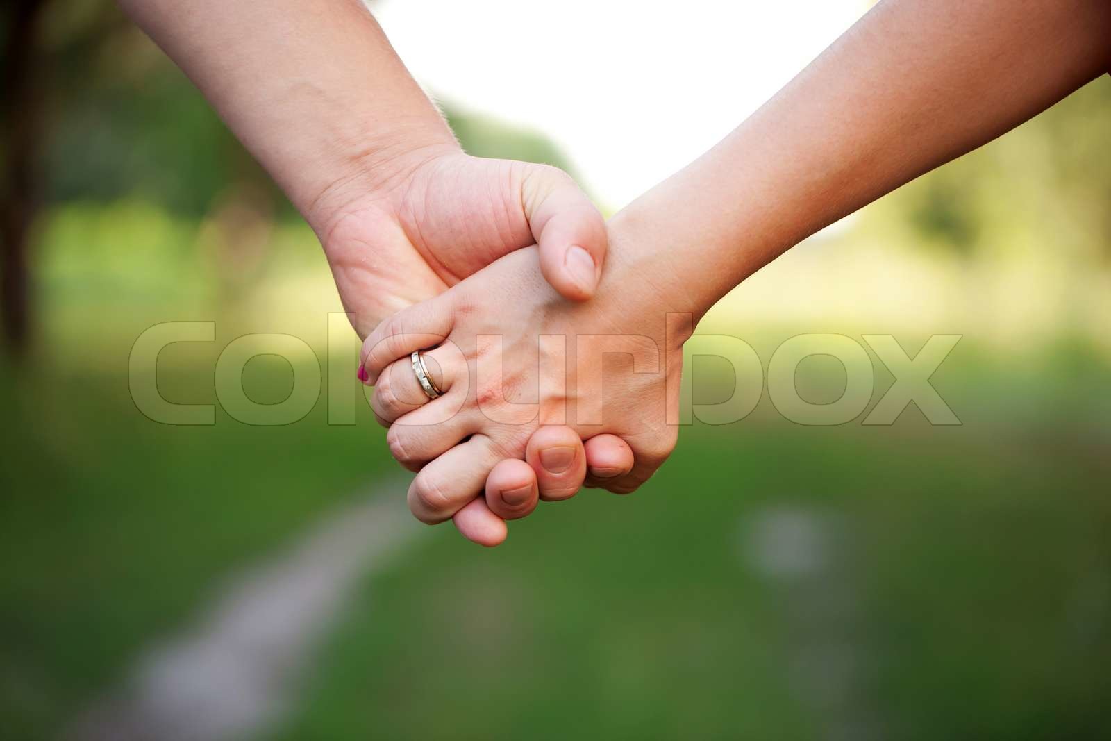 Hands of a loving couple Concept of friendship | Stock image | Colourbox
