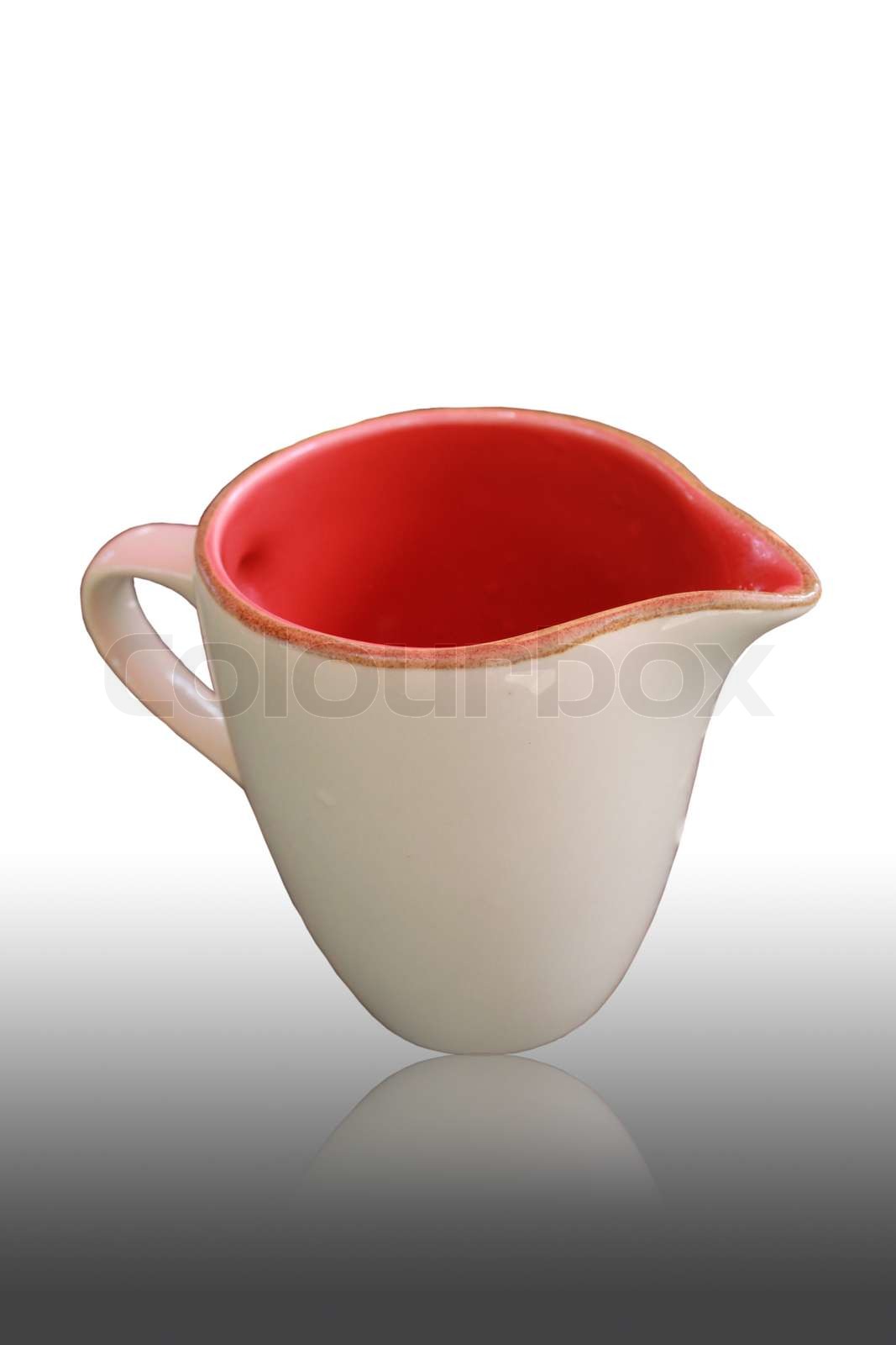 Little jug for milk isolated on white | Stock image | Colourbox