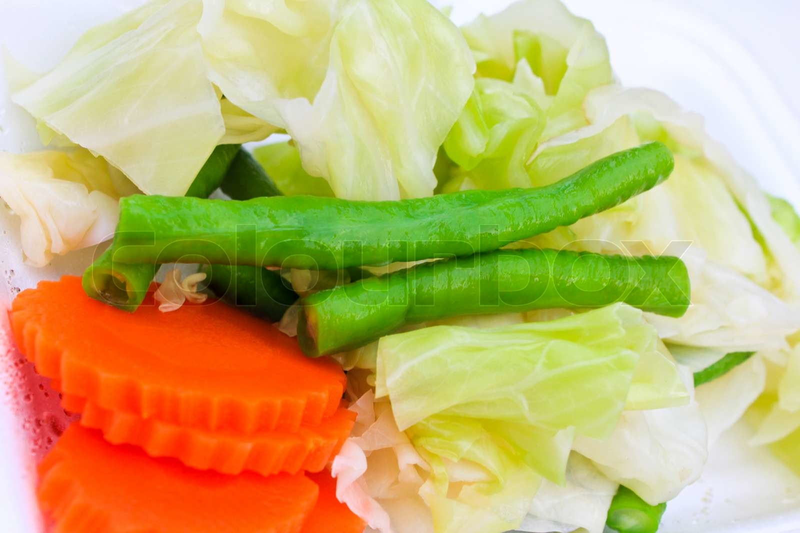 Boiled vegetables on a plate | Stock image | Colourbox