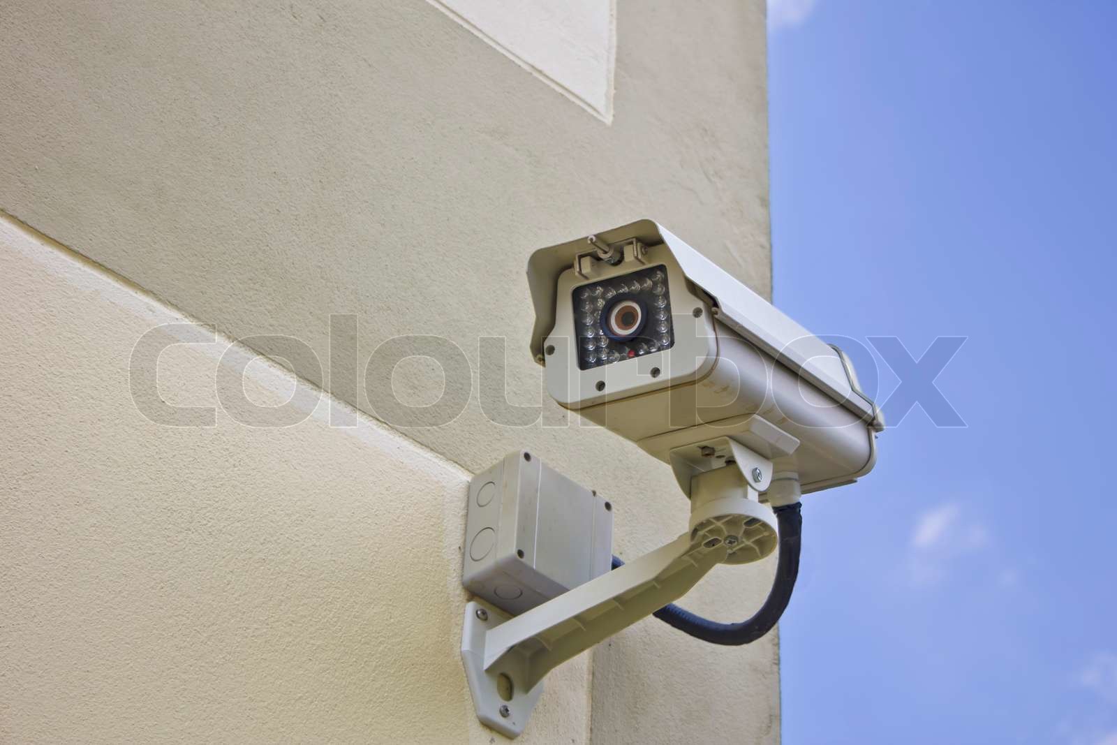 CCTV security camera at the wall | Stock image | Colourbox