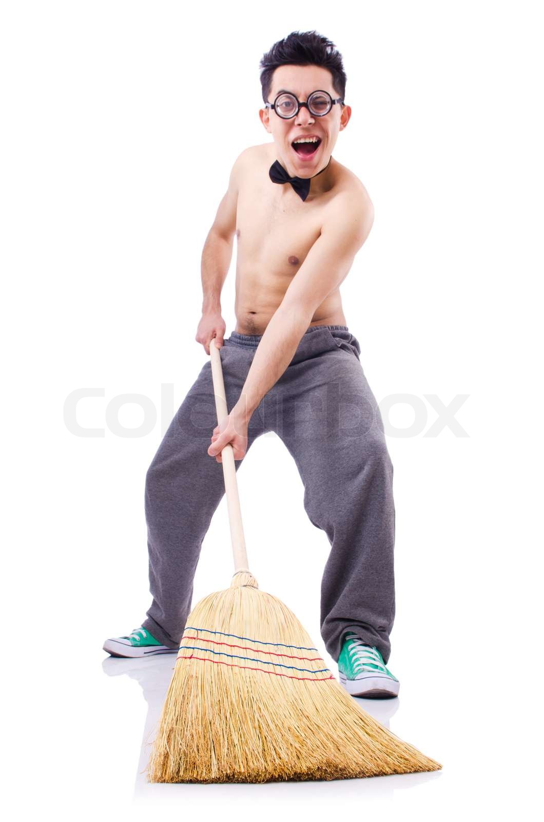 Funny man with broom on white | Stock image | Colourbox