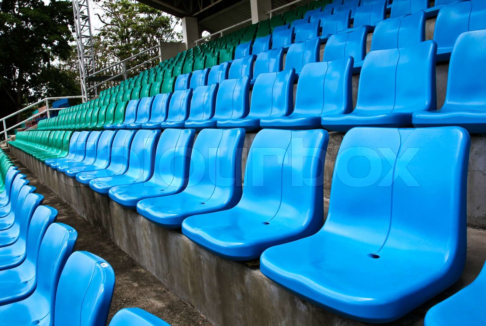 Green and blue stadium seats | Stock image | Colourbox