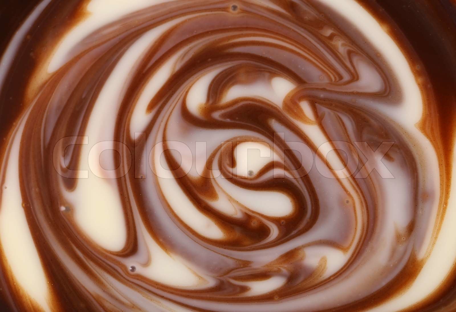 Lots of different chocolate falling from above | Stock image | Colourbox