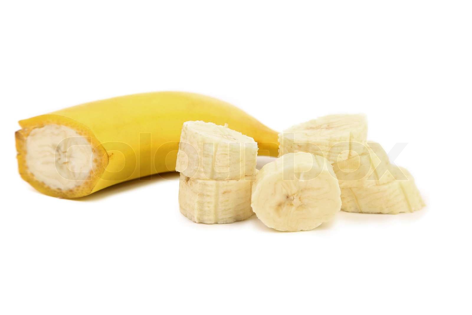 Half of banana and slices | Stock image | Colourbox