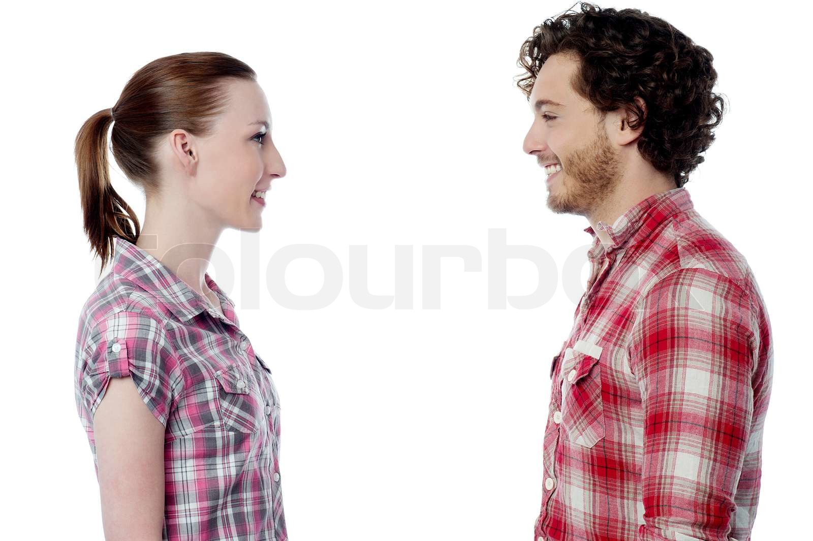 Casual young couple facing each other | Stock image | Colourbox
