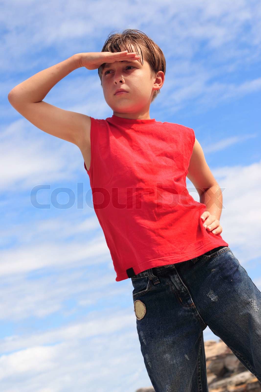 Boy searching looking hand to forehead | Stock image | Colourbox