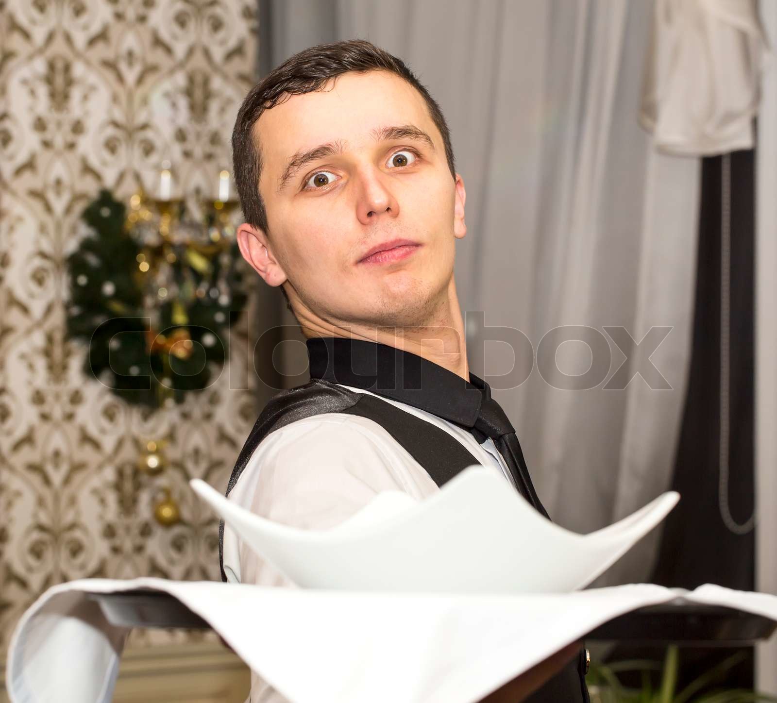 Vintage portrait of a waiter in a restaurant | Stock image | Colourbox