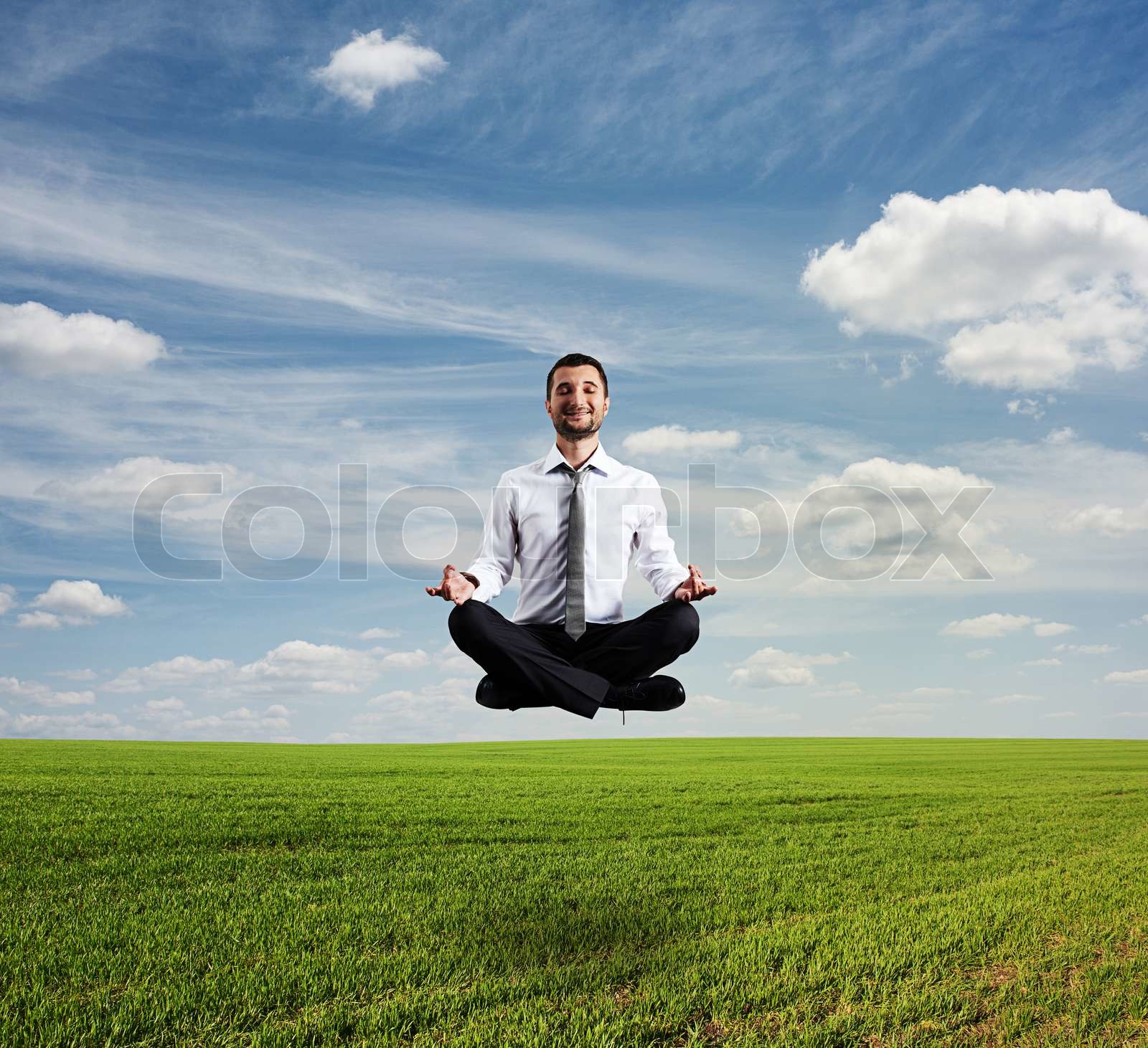 man hover over green field | Stock image | Colourbox