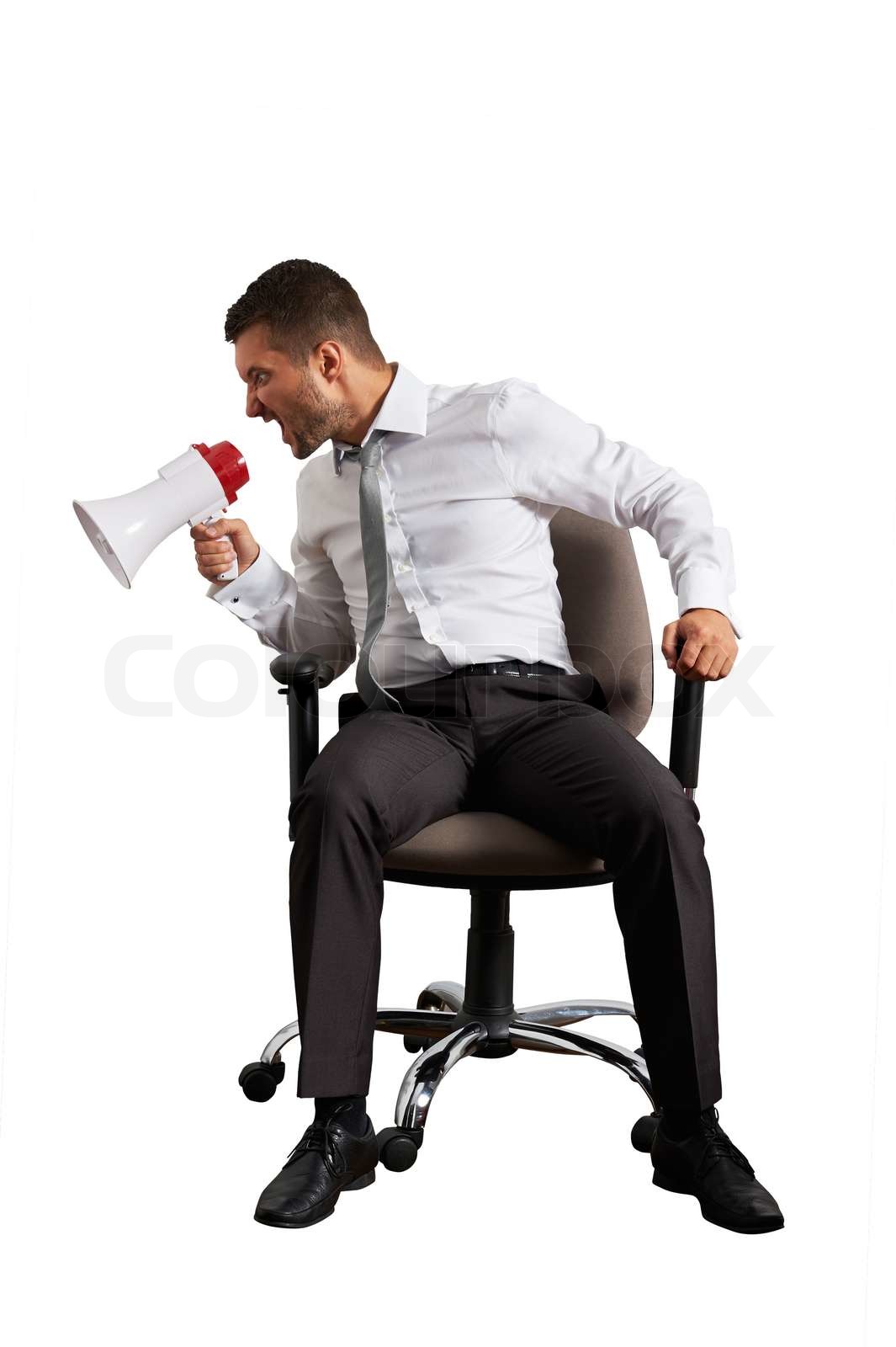 man sitting on office chair and screaming | Stock image | Colourbox