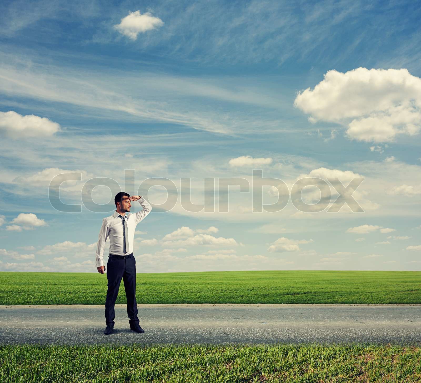 man standing on road and looking forward | Stock image | Colourbox