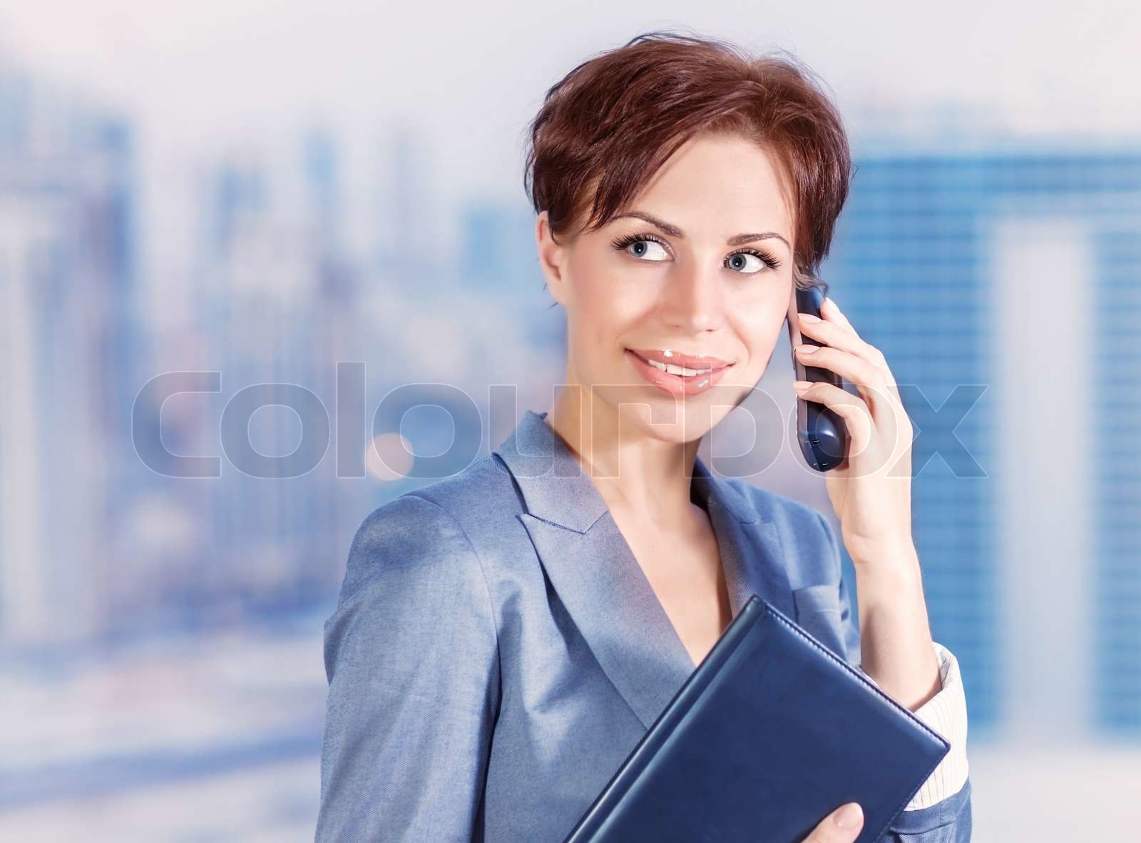 Business-Frau am Telefon | Stock Bild | Colourbox