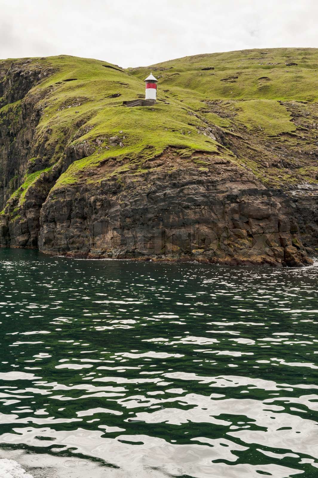 Small lighthouse in Vagar in the Faroe Islands | Stock image | Colourbox