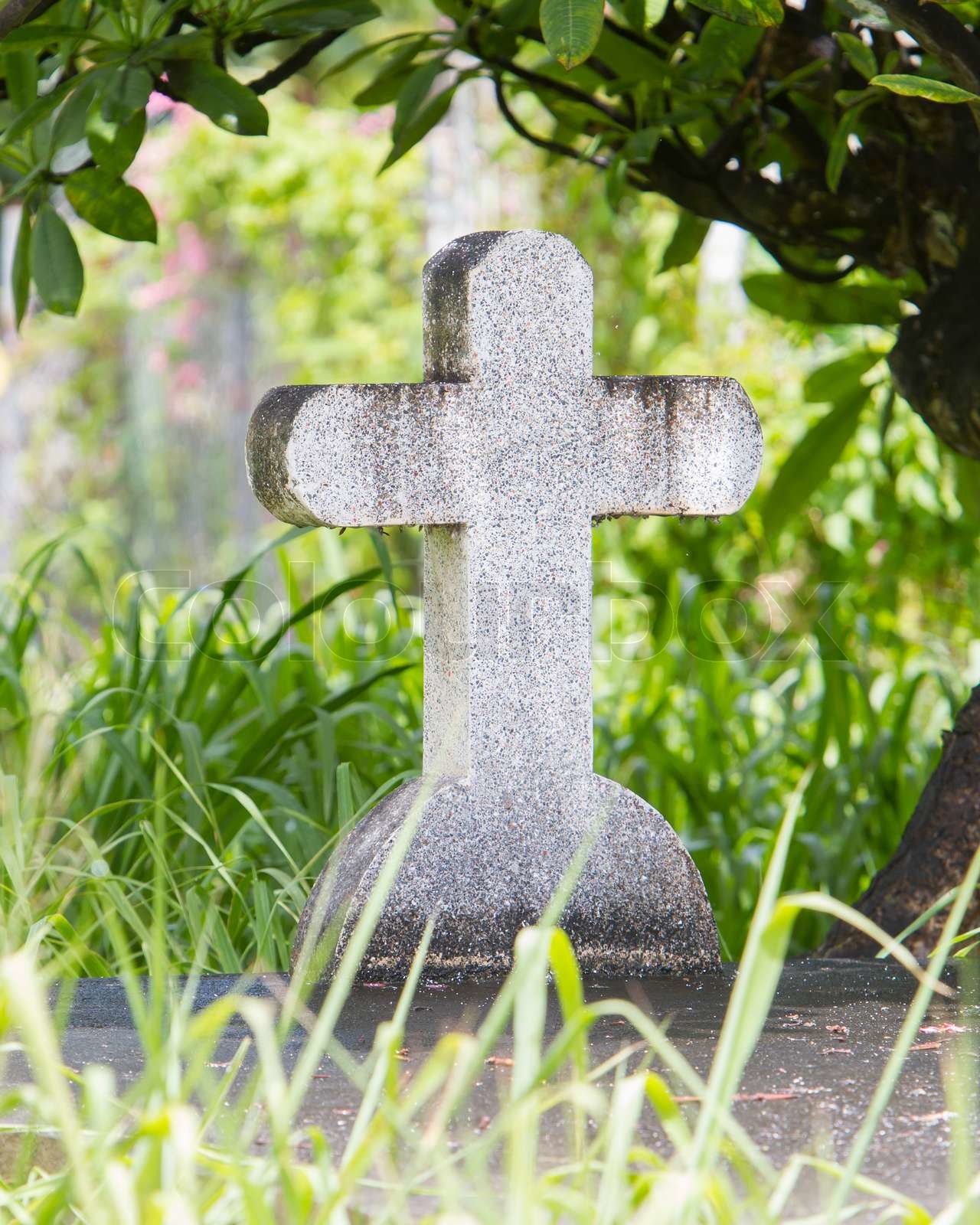 Cross on tombstone | Stock image | Colourbox