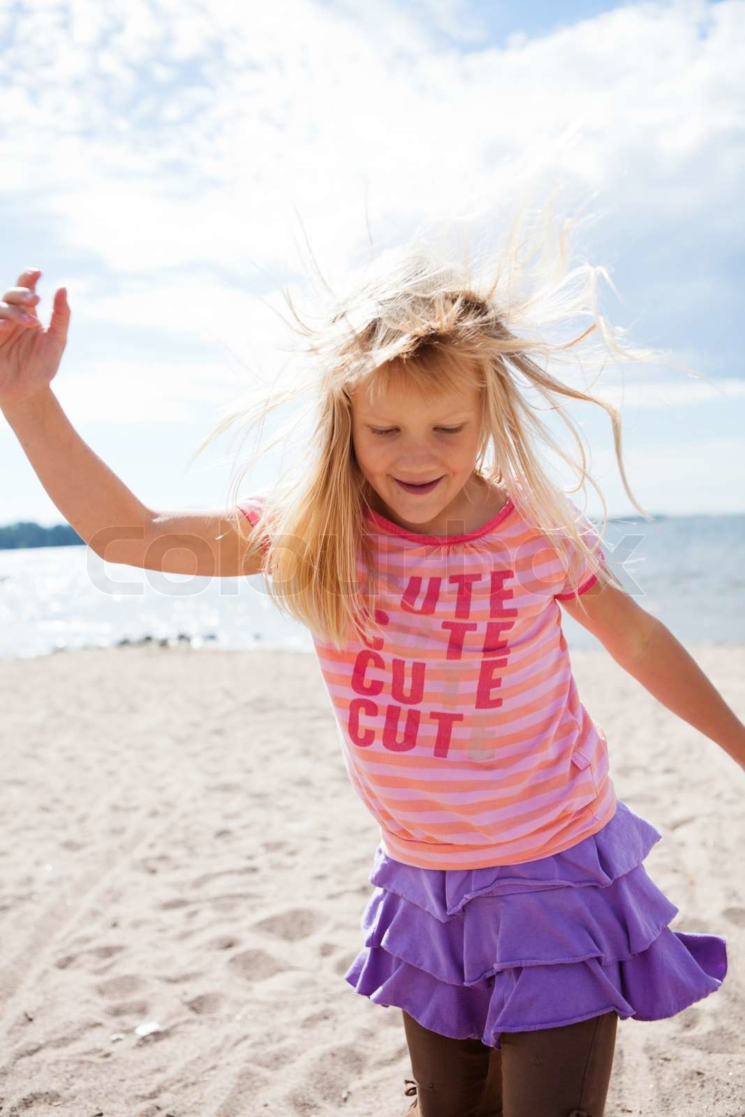 Young girl at beach | Stock image | Colourbox