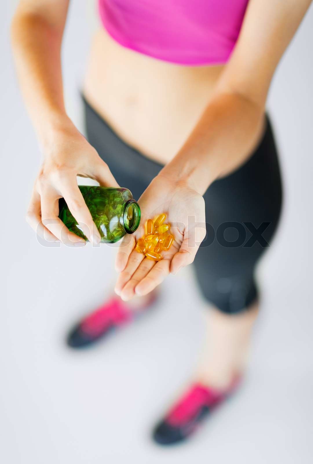woman hand with capsules | Stock image | Colourbox