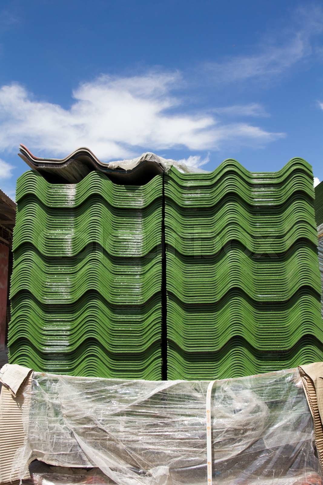 Tile roof stack in construction site | Stock image | Colourbox