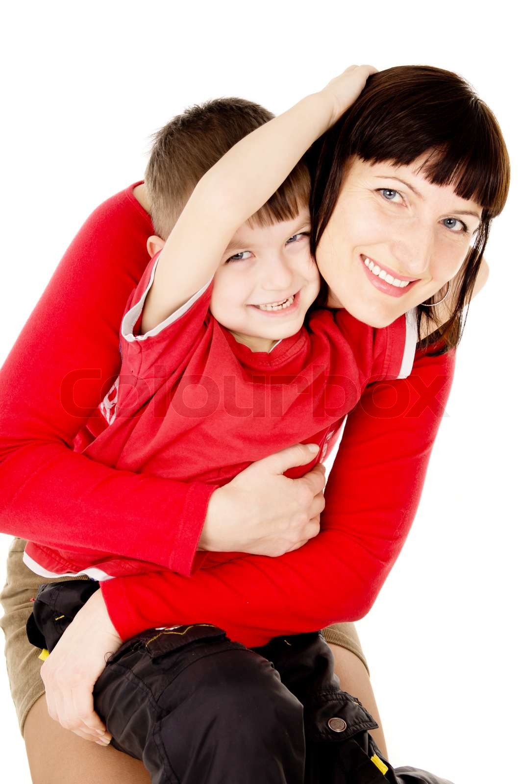 mom hugging with a small child | Stock image | Colourbox