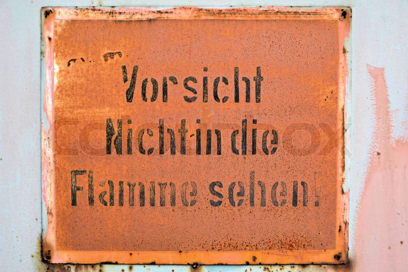 Sign on an abandoned industrial building | Stock image | Colourbox