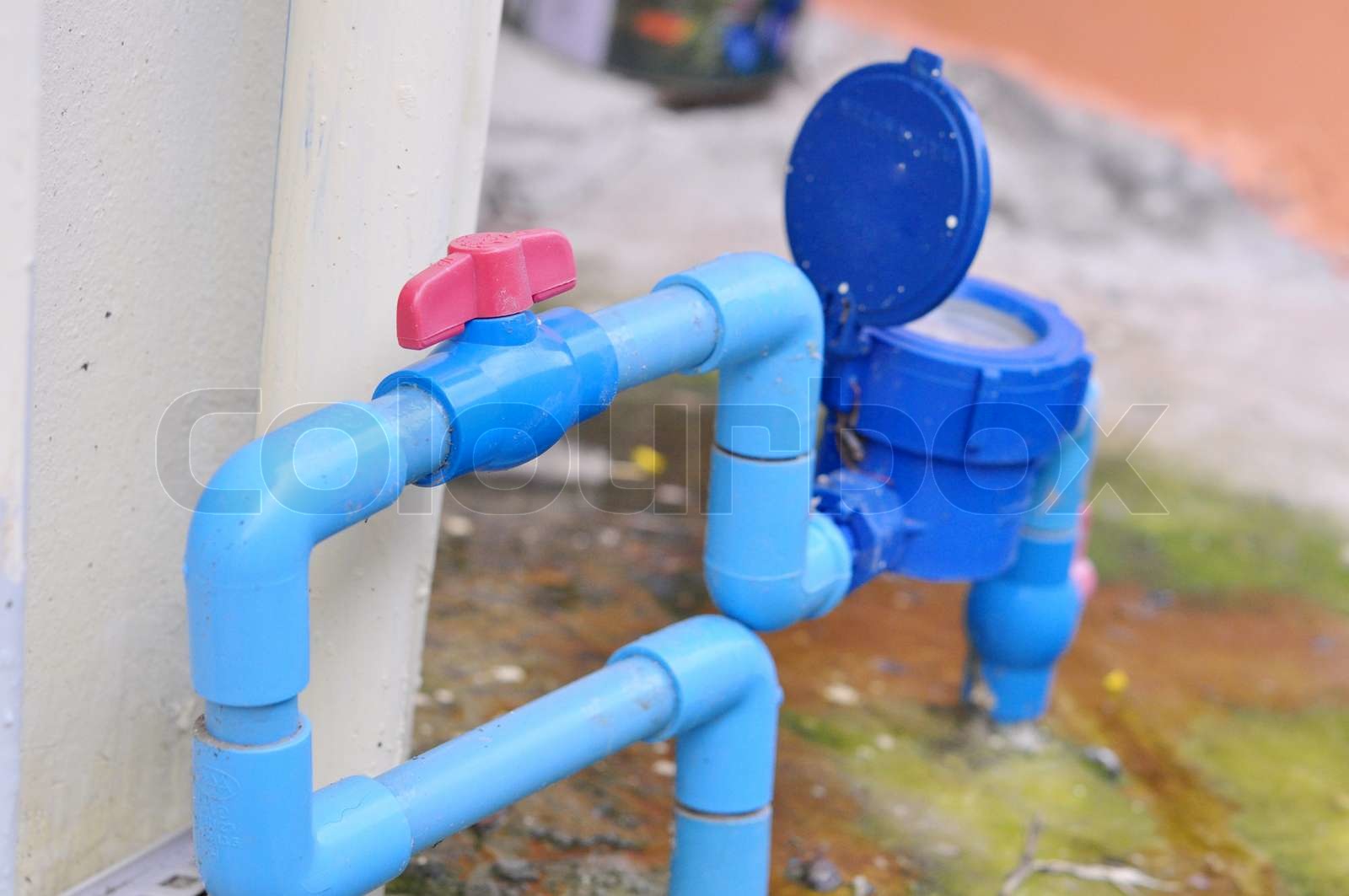 Water valve connects to PVC pipe | Stock image | Colourbox