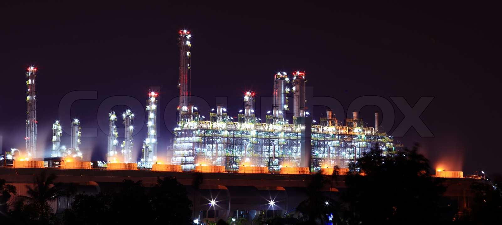 panoramic view of oil refinery factory at night | Stock image | Colourbox