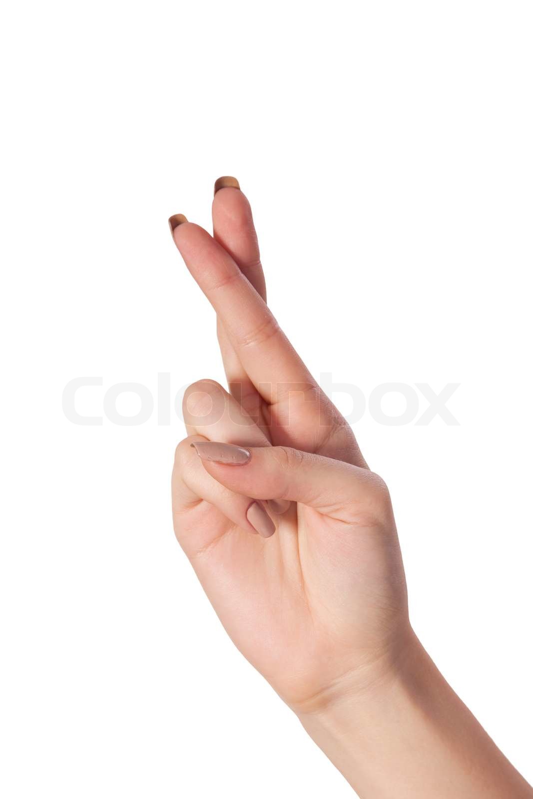 Crossed fingers symbolizing good luck isolated on white | Stock image ...