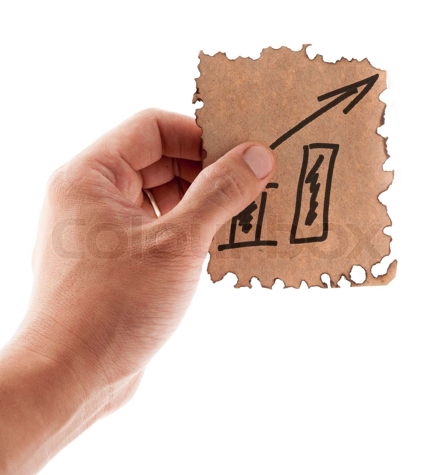 Hånd, der holder stykke af brændt papir på hvidt backgroundmarketing ...