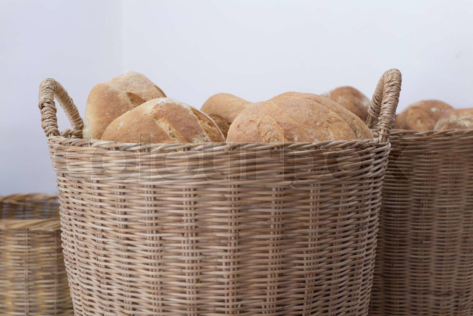 Bread baton in bamboo basket | Stock image | Colourbox