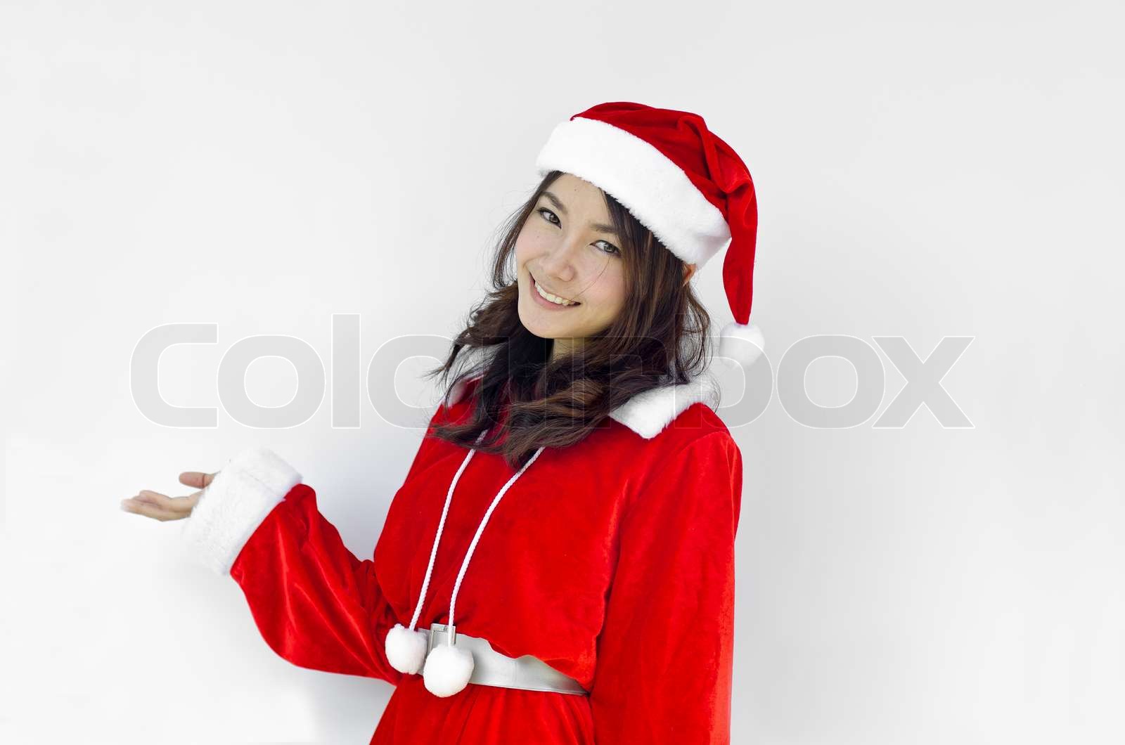 Smuk ung julemand kvinde, isoleret | Stock foto | Colourbox