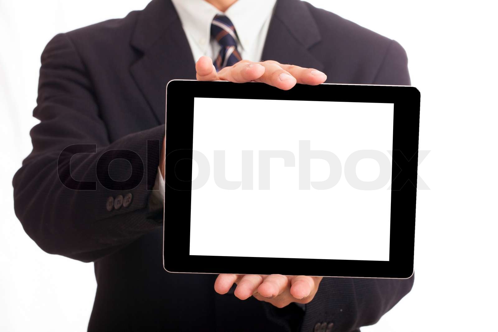 Unternehmer, die eine Tablette | Stock Bild | Colourbox