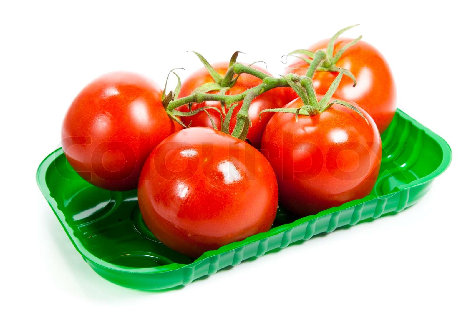 Nahaufnahme von Tomaten auf die Reben auf weißem Tomate Zweig isoliert ...