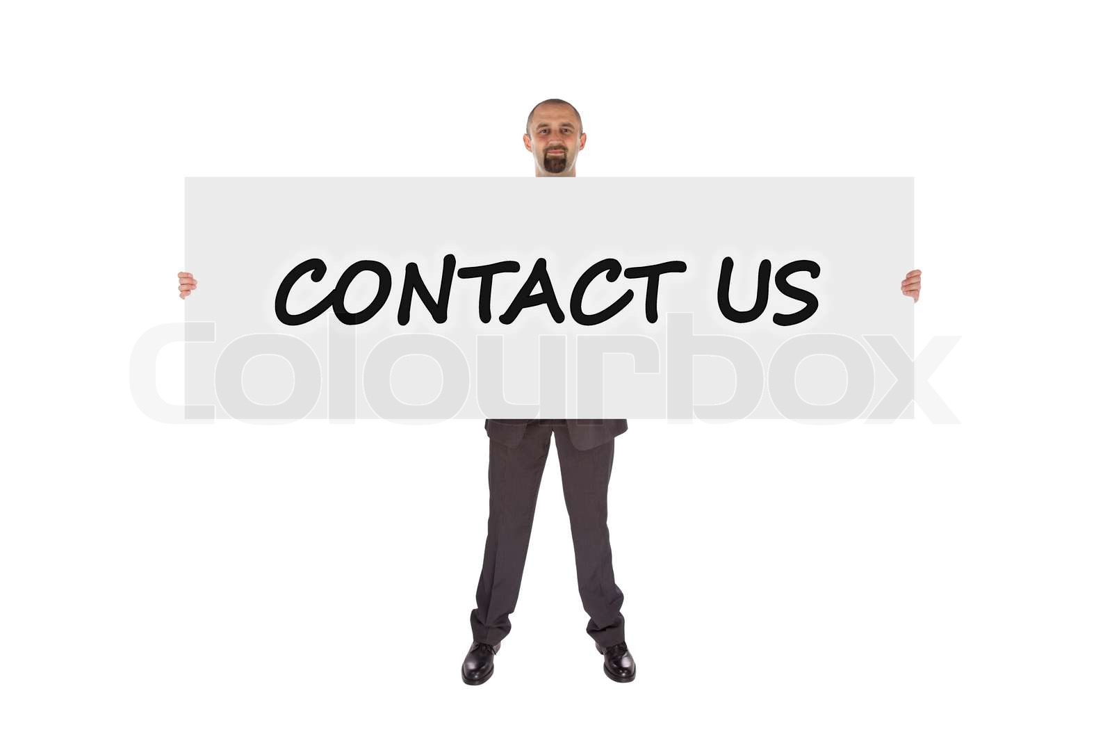 Business man showing large sign, Contact us | Stock image | Colourbox