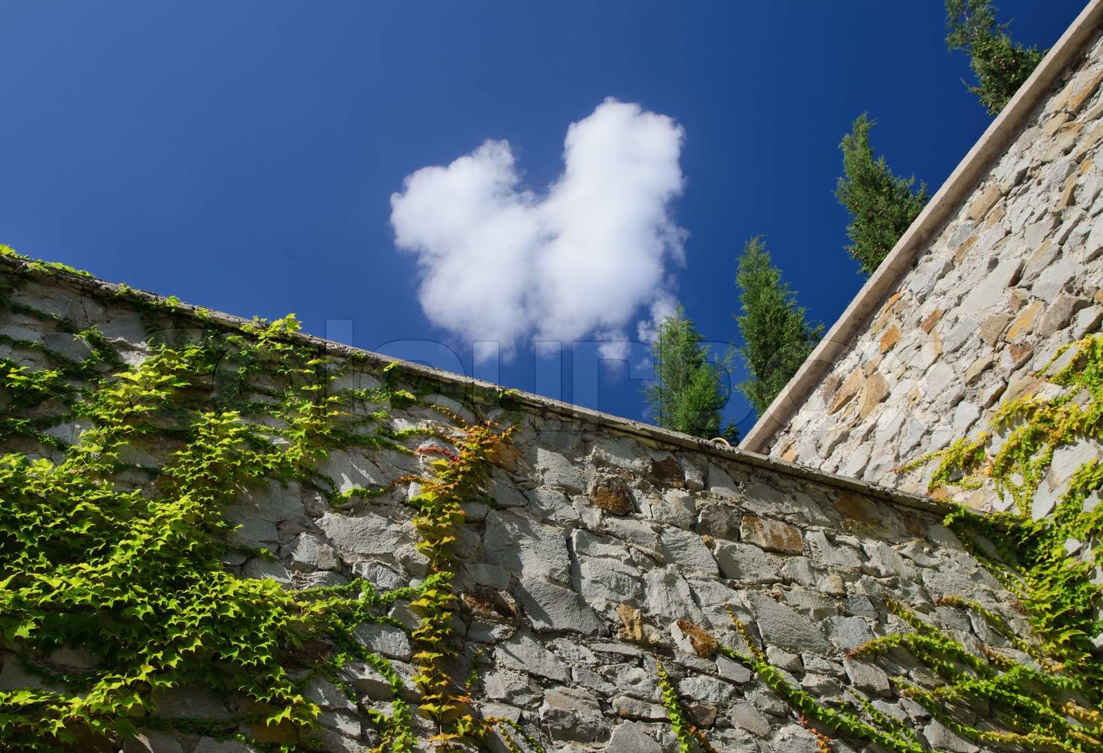 High stone perimeter wall | Stock image | Colourbox